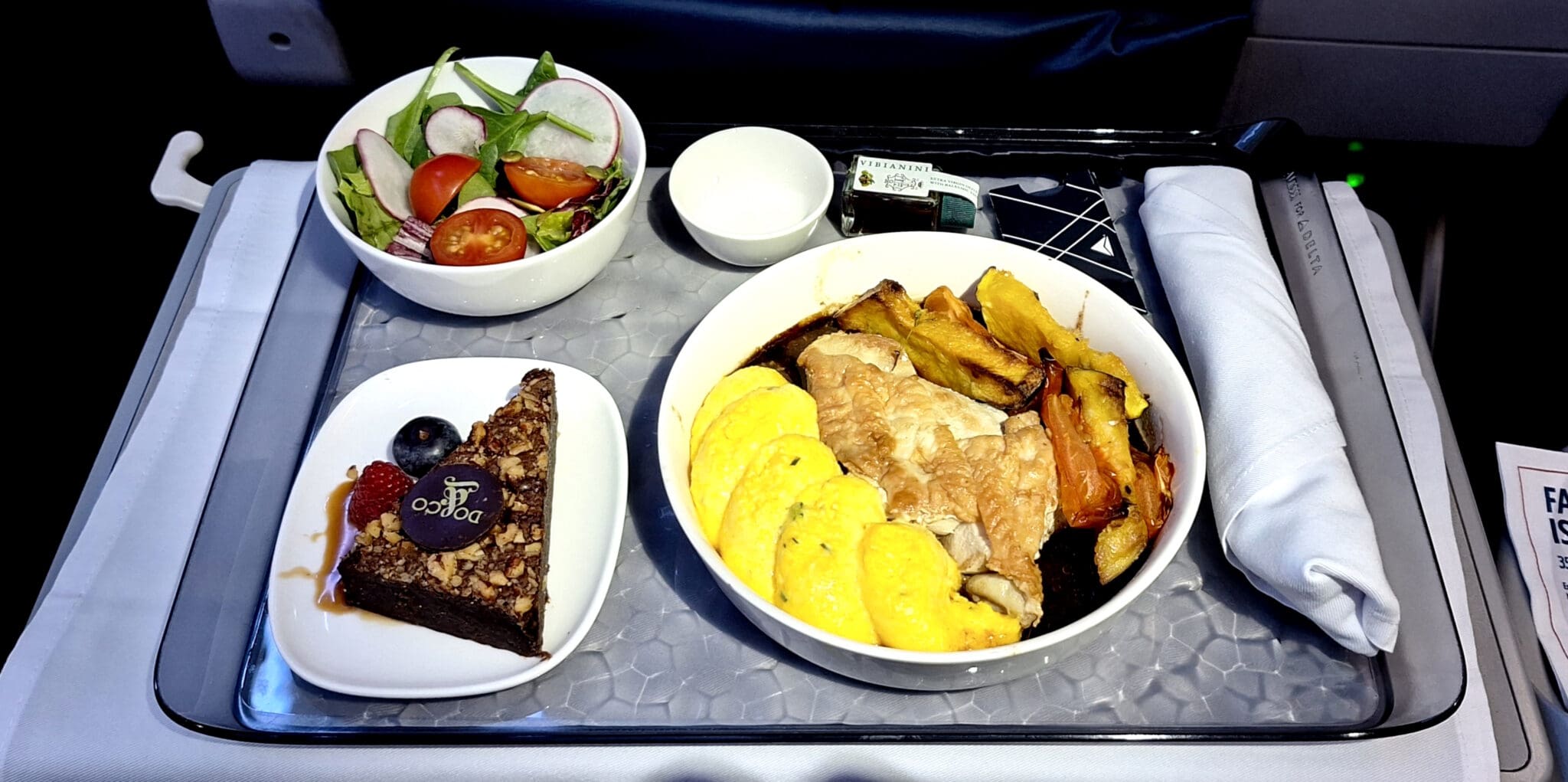 Delta First Class Lunch Review - Chicken Thighs in Gravy with Polenta ...